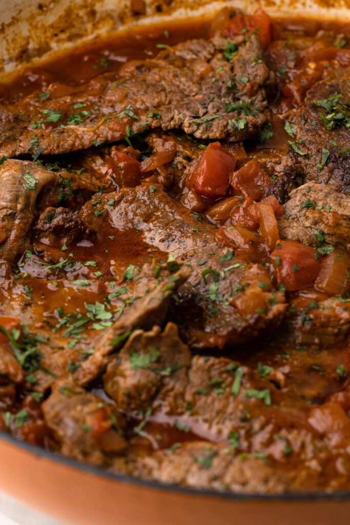 Carne en Bistec (Colombian Steak with Tomatoes and Onions) - Everyday Family Eats